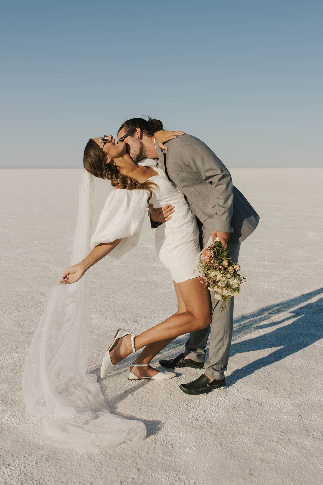 Couple Enjoys Memorable Moments at Bonneville Salt Flats Sunset Elopement